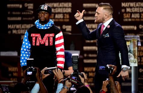 بوکس؛ گزارش کنفرانس مطبوعاتی کانر مک گرگور و فلوید می ودر؛ درگیری لفظی