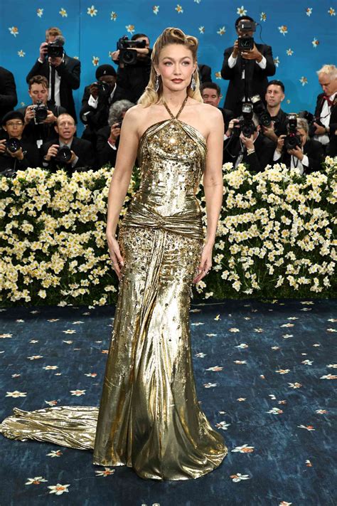 Gigi Hadid In A Retro Gown And Pin Curls At The 2025 Met Gala