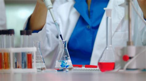 Female Scientist Pouring Chemical Reagent In Stock Footage SBV 313083423 Storyblocks