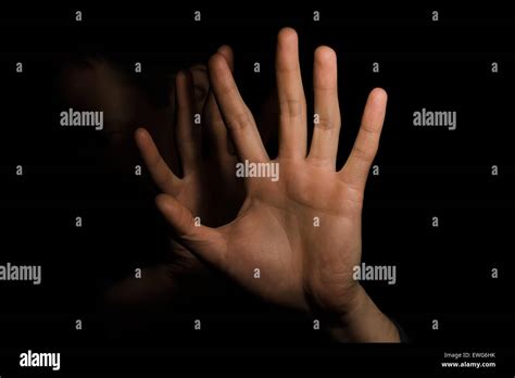 Man Hides A Face Stock Photo Alamy