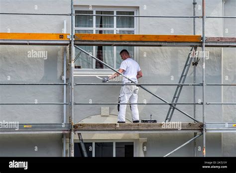 Painter At Scaffold Stock Photo Alamy