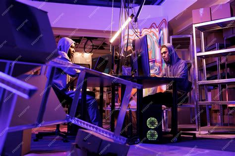 Free Photo Two Hackers Coding Computer Worm