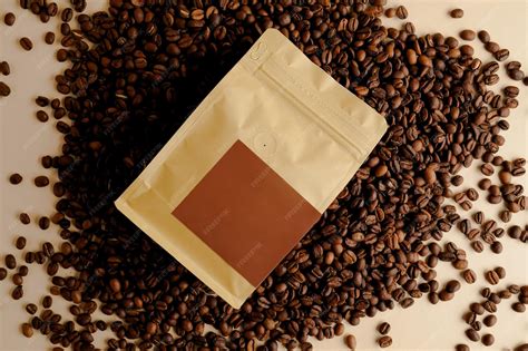 Premium Photo Light Brown Coffee Packaging On Top Of Roasted Coffee