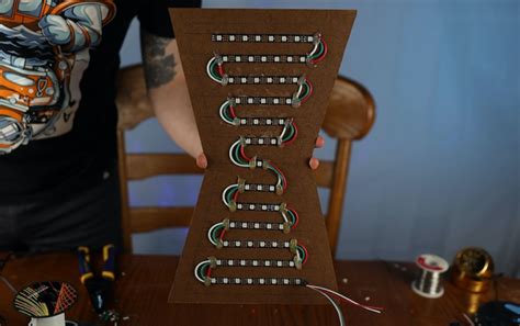 flip this diy hourglass over and watch its leds fall like sand