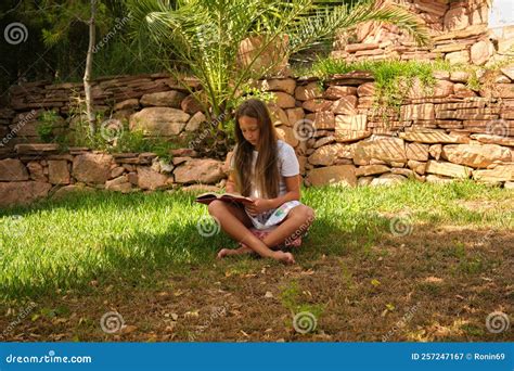 Girl With A Book In The Garden Stock Image Image Of Portrait Lifestyle 257247167