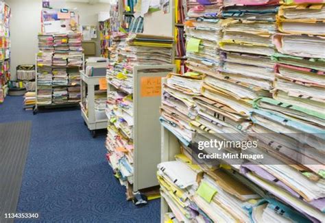Messy Stacked Paper Photos And Premium High Res Pictures Getty Images