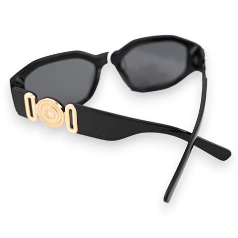 Black Rectangular Glasses With Golden Jewelry Arms