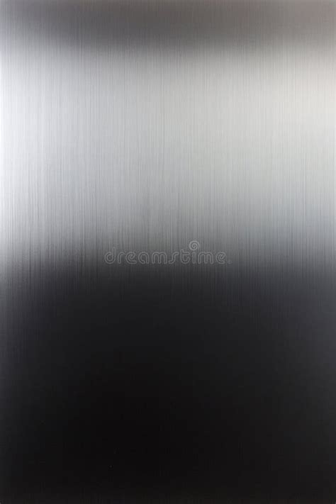 A Smooth Grainy Gradient Transitioning From Metallic Silver To Deep Charcoal Gray Stock