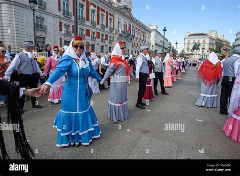 People During The Traditional Parade Dancing Through Madrid A Popular