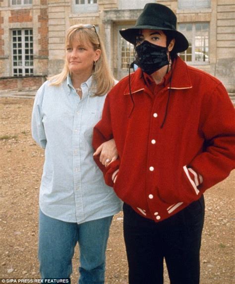 Debbie Rowe And Fiancé Marc Schaffel Fly Into Brazil With Belgian Pop