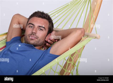 Man Laying In Hammock Stock Photo Alamy