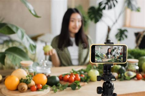 Woman Cooking Vlogger Live Streaming Her Video Blog While Showing How