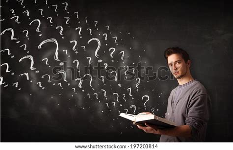 Confused Man Reading Book Question Marks Stock Photo Shutterstock