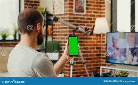 Office Worker Analyzing Smartphone With Greenscreen Template Stock