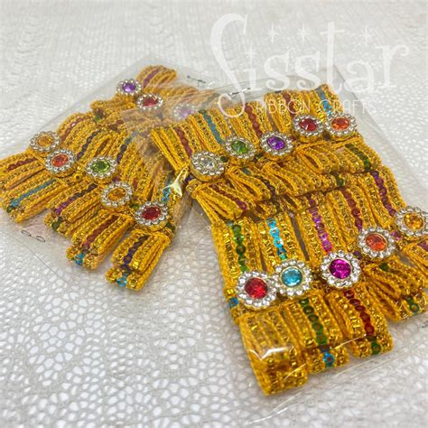 อุปกรณ์ตกแต่งโปรยทาน โบว์ติดโปรยทาน ดิ้นทองติดโปรยทาน บาตรพระ ริบบิ้นทอง Shopee Thailand