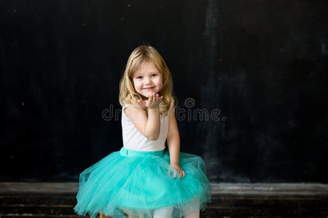 Lovely Girl Sitting On A Chair Lovely Girl Sitting On A Chair Stock