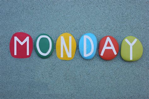 Monday First Day Of The Week Composed With Stone Letters Over Green