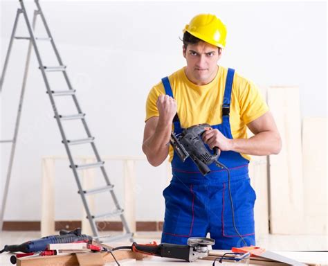 The Floor Repairman Disappointed With His Work Floor Repairman Disappointed With His Work Photo