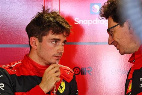 charles leclerc disagrees with mattia binotto as ferrari boss at risk