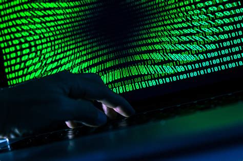 Hand Typing On Laptop Keyboard Green Numbers On Display Hacker Forcing The System Programmer