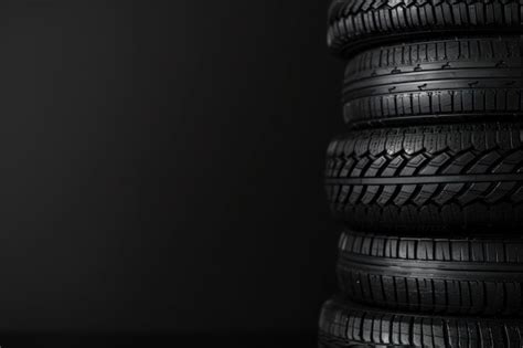 New Tires Pile On A Dark Black Background Tire Fitting Background With