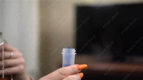 Woman Sets Up A Nebulizer Prepare Makes Inhalations With A Nebulizer At Home Stock Video Adobe