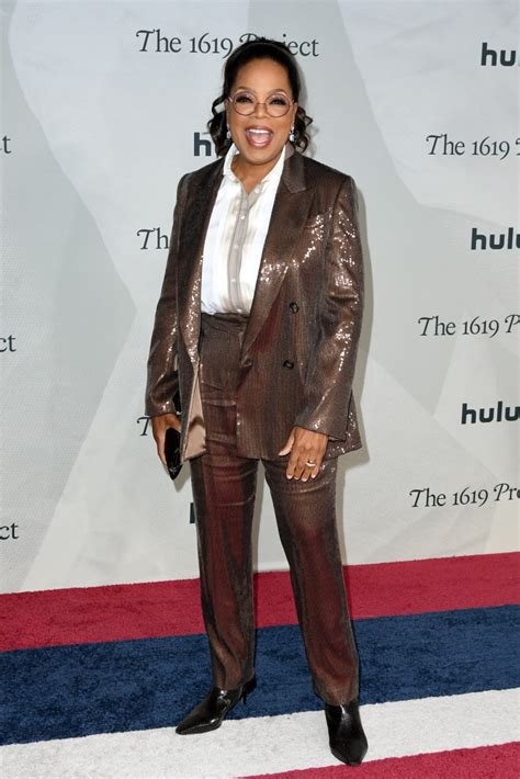 Oprah Winfrey Sparkles In Crocodile Boots At The 1619 Project Premiere Footwear News