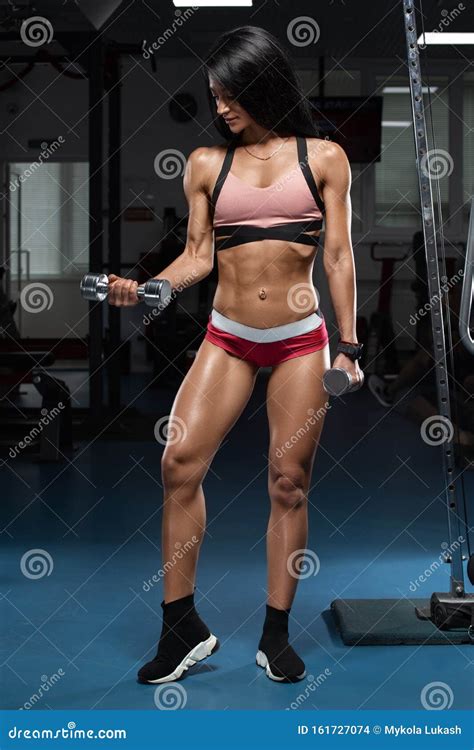 Fitness Woman Doing Exercise For Biceps In Gym Muscular Woman Workout