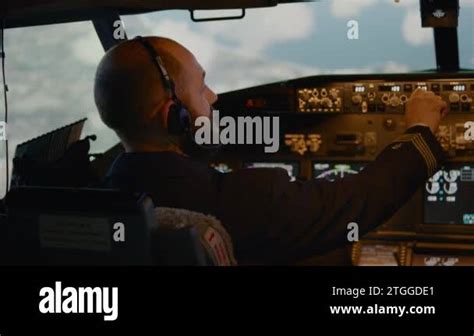 airline captain fixing altitude and longitude to fly airplane using