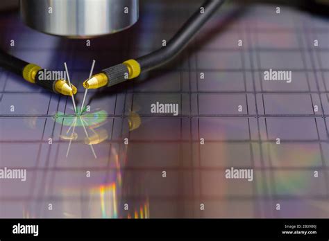 Close Up Of Examining A Sample Of Microchip Transistor With Probe Station Under The Microscope