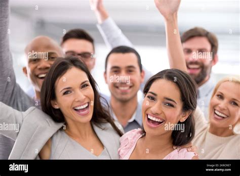 Weve Made It To The Big Time A Group Of Businesspeople Smiling And