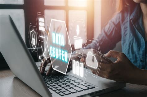 Person Hand Typing On Keyboard Computer With Data Center Icon On Virtual Screen Cloud Computer