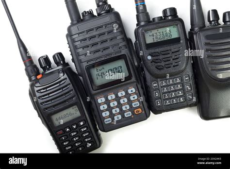 Various Models Of Two Way Radio Communication Devices On A White