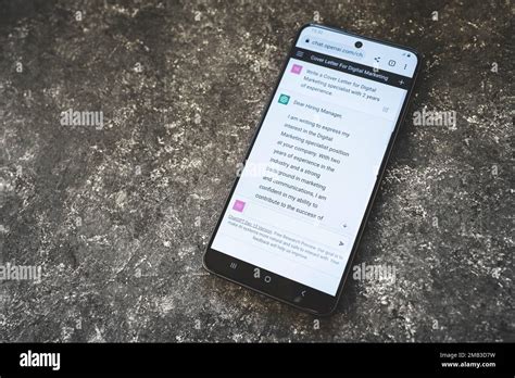 chatgpt open ai chat bot on phone screen chat gpt writes a cover