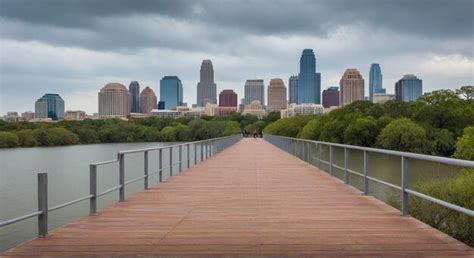 A Bridge With A View Of A City Skyline In The Background Premium Ai