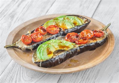 Premium Photo Baked Eggplant With Avocado
