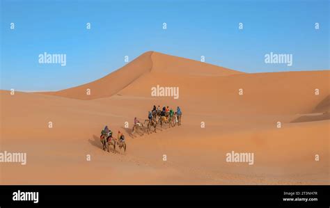 Sahara Desert Morocco 13 September 2022 Tourists On A Camel Ride