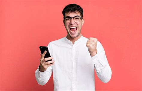 Premium Photo Adult Man Using His Smartphone