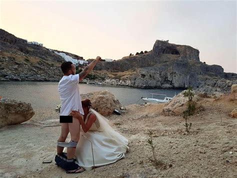 Infamous Oral Sex Wedding Image Leads To Couples Being Banned From
