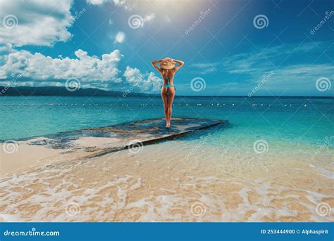 Woman Relaxing Under The Sun At The Crystalline Sea Stock Photo Image Of Back Trip