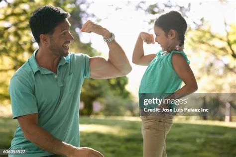 Dad Flexing Photos And Premium High Res Pictures Getty Images
