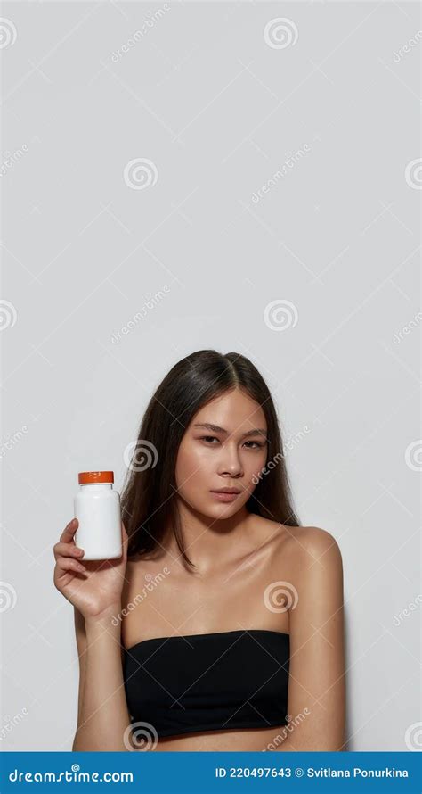 Portrait Of Young Asian Girl Holding Pills Can Stock Image Image Of