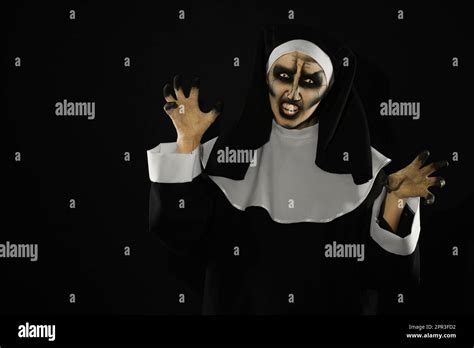 Scary Devilish Nun Frightening On Black Background Space For Text