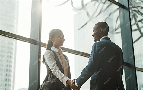 premium photo formal business introduction handshake by windows