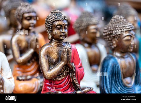Buddha statue figures souvenir on display for sale on street market in ...