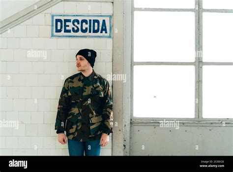 Adult Man Standing At Window Near The Stairs In Entrance Hall Stock Photo Alamy