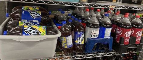 Shelf Of Assort 2l Pop Couple 1l North American Auction Llc