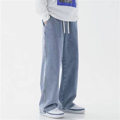 กางเกงยีนส์ยาวชาย ทรงกระบอกเอวสูง ใส่สบาย เอวยางยืด ปรับเอวด้วยเชือก เท่ๆเข้ากับทุกแนว 9สี