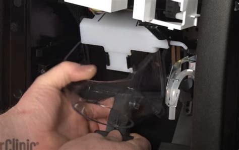 5 Steps To Remove Ice Dispenser Cover On A Whirlpool Refrigerator