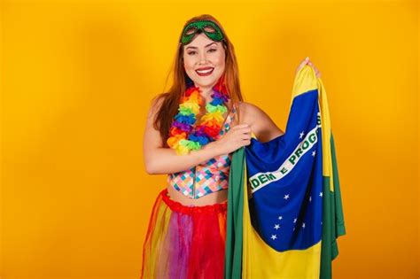 Premium Photo Brazilian Redhead In Carnival Clothes With A Flower Necklace Around Her Neck